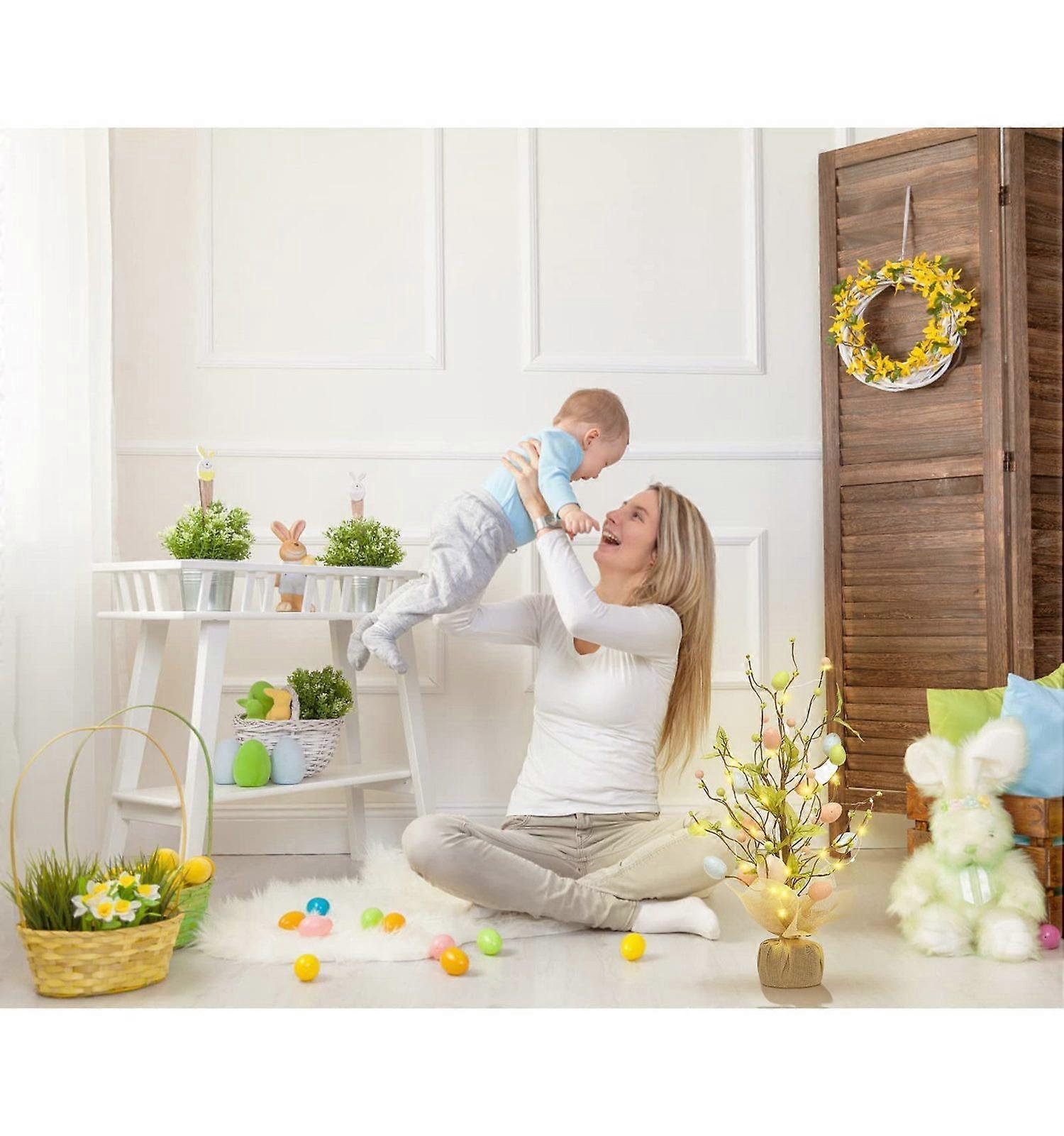 Decorative figures, vibrant Easter eggs, beautifully decorated egg tree ...