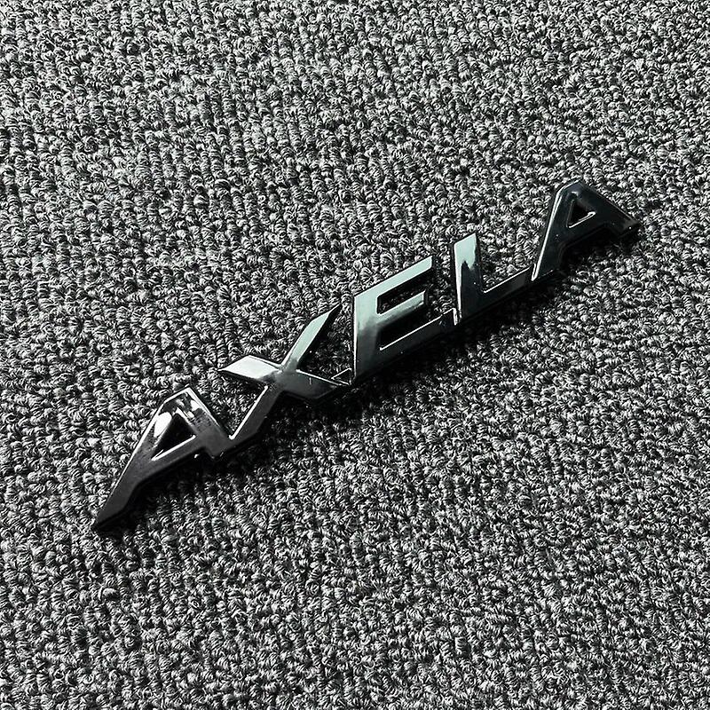 On Mazda3 rear emblems AXELA logo Skyactiv logo in black letters~9672 ...