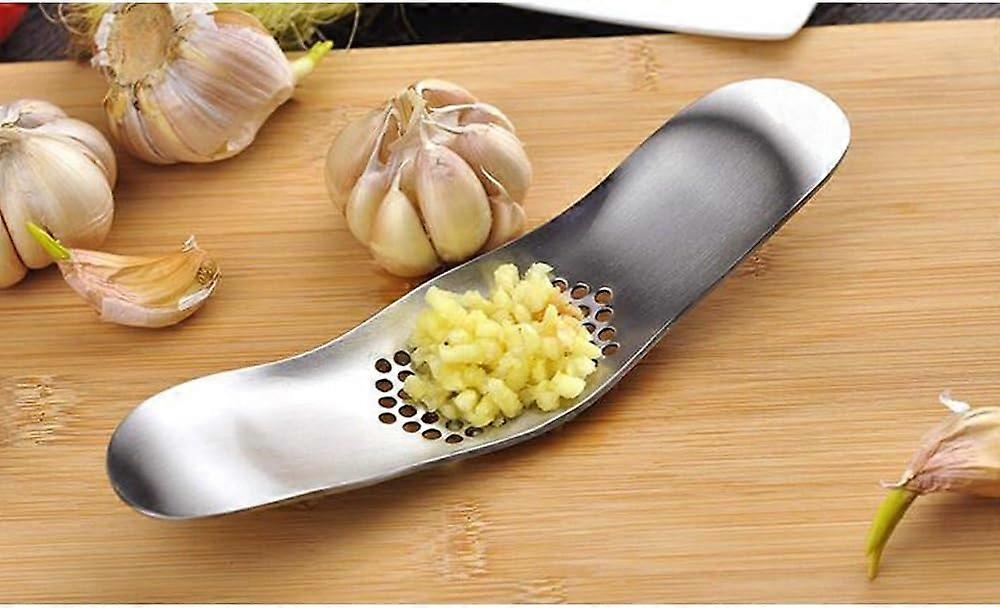 Garlic press Garlic rocker in metal construction, made of stainless ...