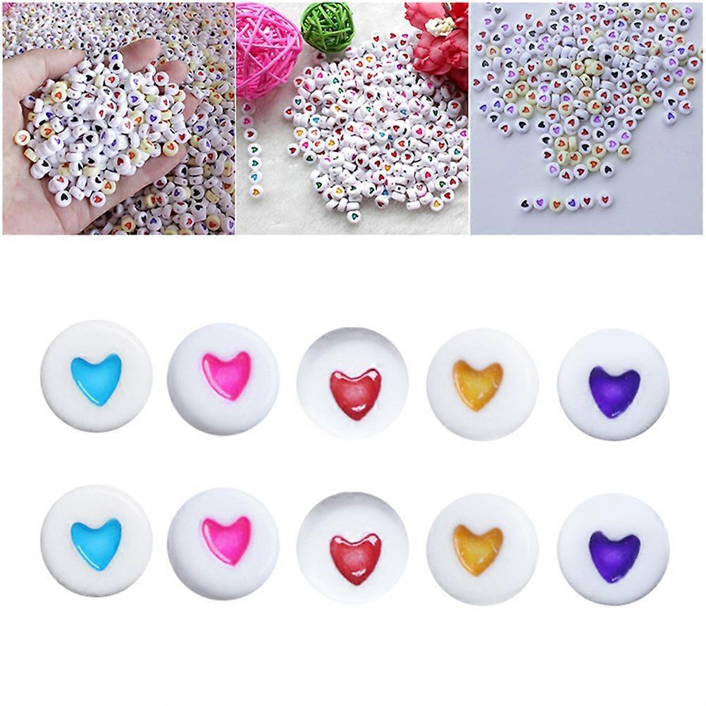 Assorterede farver hjerteformede perler akrylperlesæt til børn, der ...