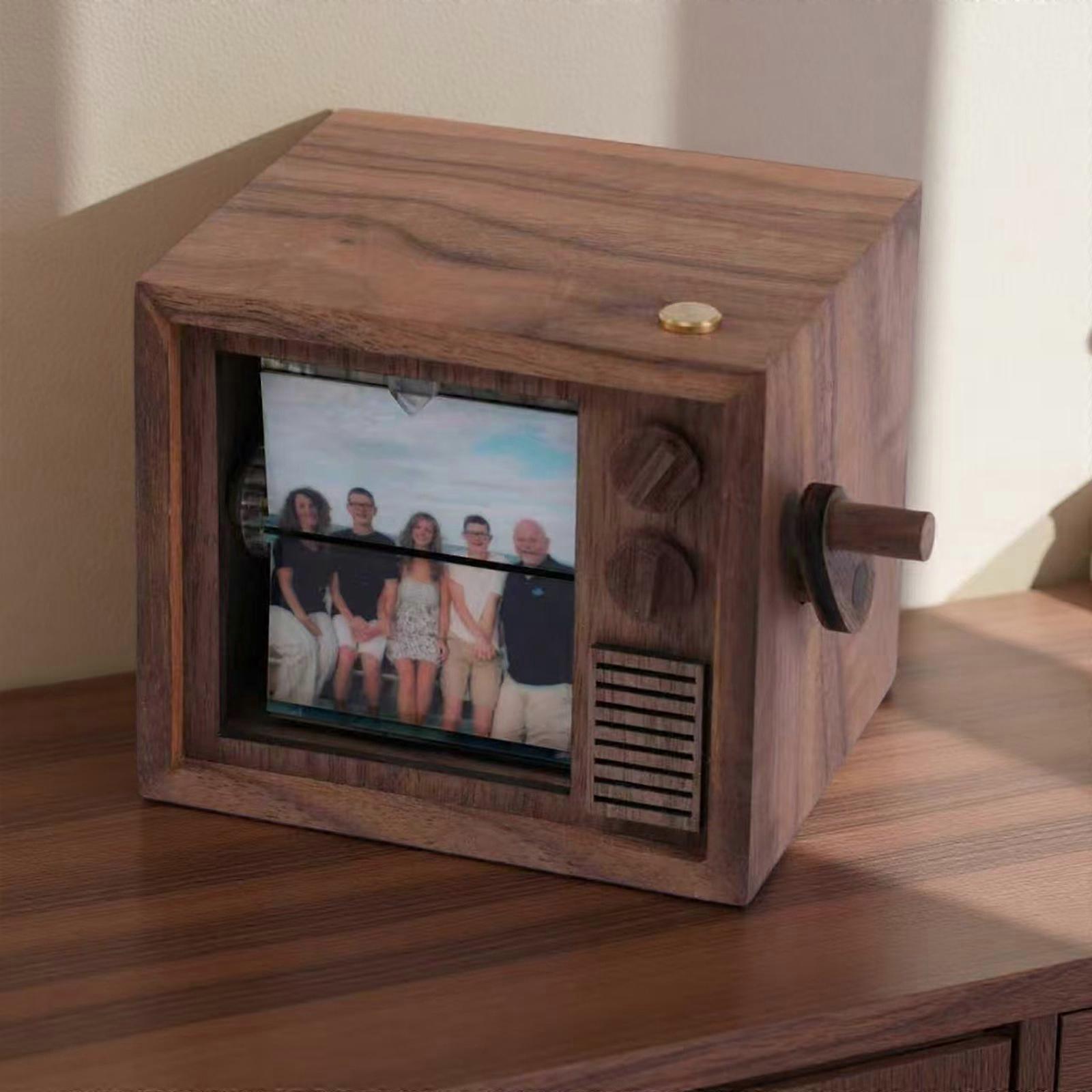 Illuminated, hand-cranked flipss-page photo machine with 16-photo album ...