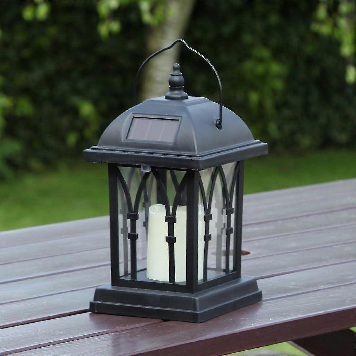 Black Solar Lantern With Led Candle And Deceptively Real-Looking ...