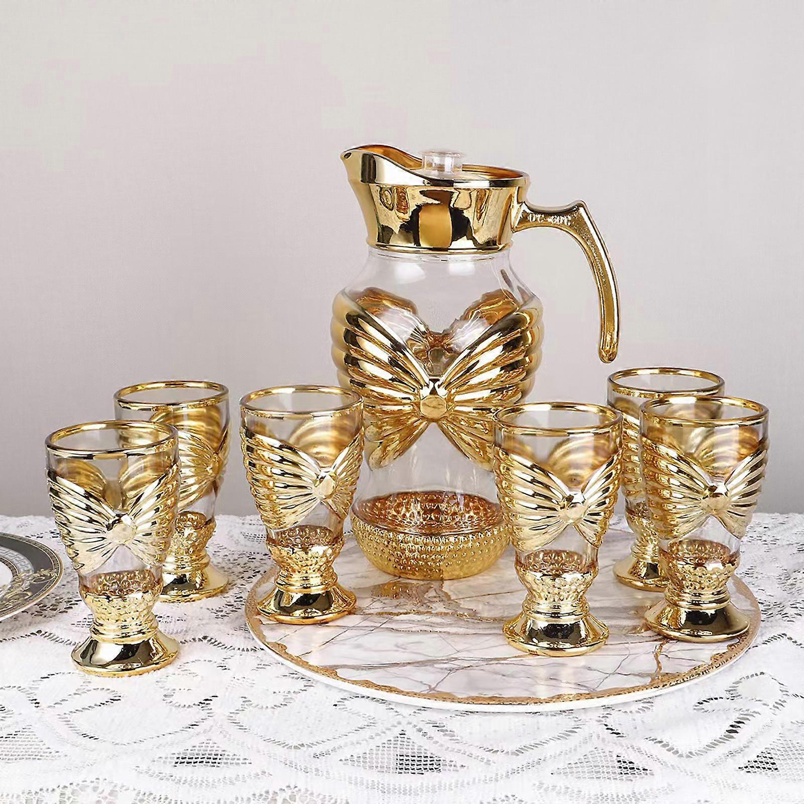 Golden Glass Water Pitcher Set with 6 Cups on Buffet Table or ...