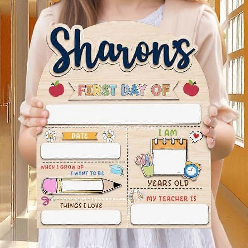 Back-to-school sign, holding a check-in sign to commemorate the start ...