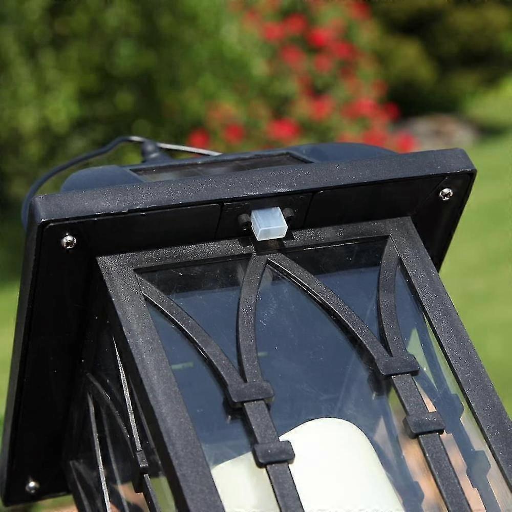 Black Solar Lantern With Led Candle And Deceptively Realistic ...