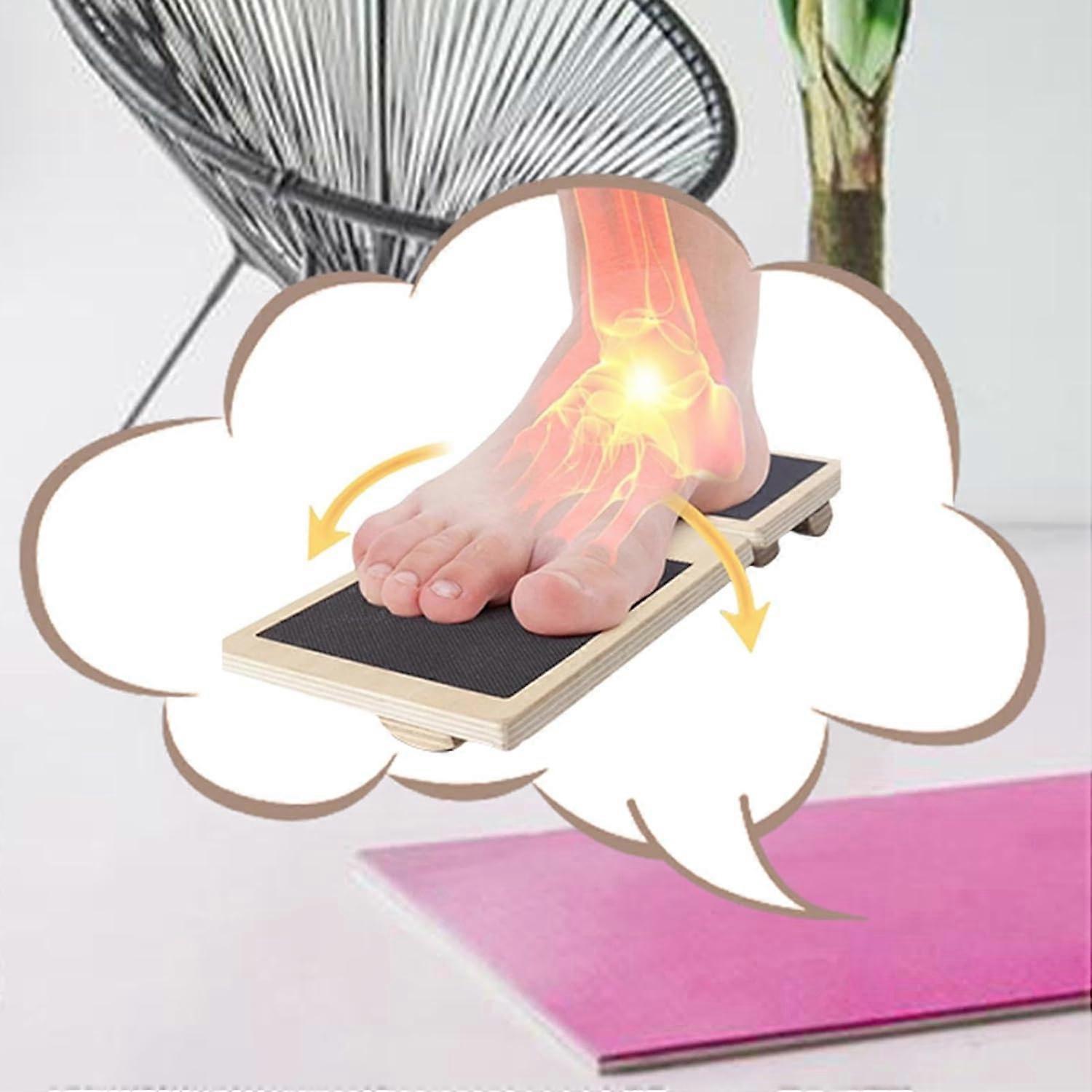 Ankle and foot strengthening exercise - one-leg wooden balance board ...